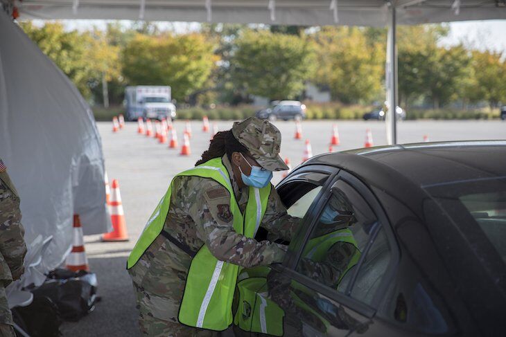 See the Delaware National Guard Drive-Thru Vaccine Tent Setup