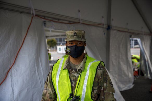 See the Delaware National Guard Drive-Thru Vaccine Tent Setup