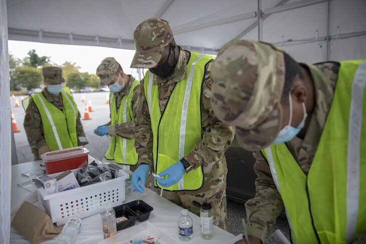 See the Delaware National Guard Drive-Thru Vaccine Tent Setup